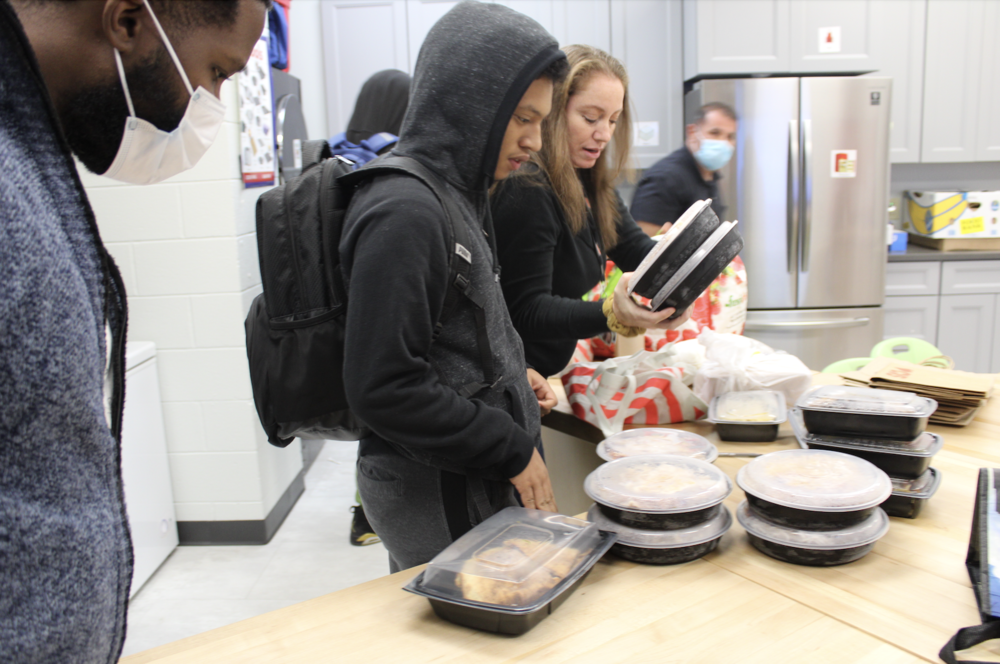 Students Assist with Food Pantry | Dr. Kenneth B. Clark Academy